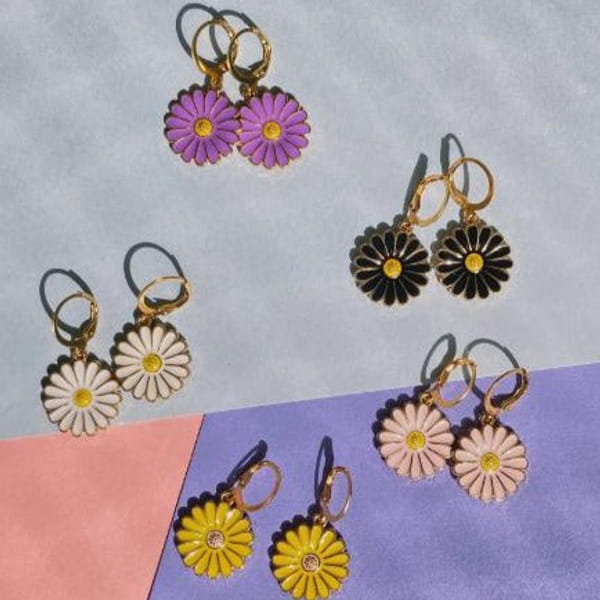 Buy/Send Earring Daisy Huggies Online | IGP | JVS1218681