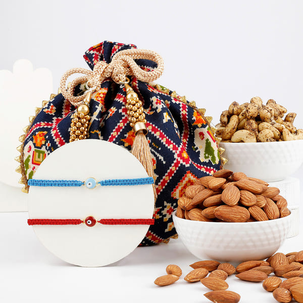 Evil Eye Rakhi Set Of 2 With Dry Fruits Potli: Gift/Send Food Gifts ...