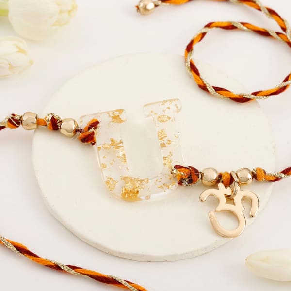 Buy/Send Personalized Resin Initial Rakhi U Online | IGP | JVS1264132