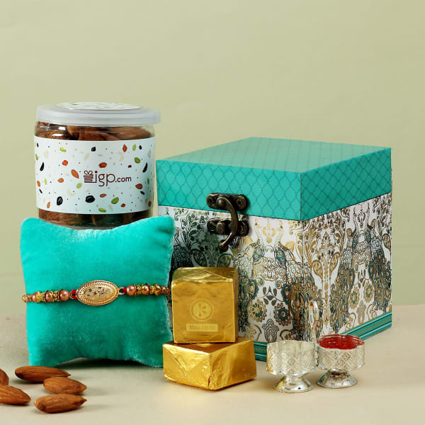 Rakhi with Almonds & Mewa Bites and Silver Plated Roli Chawal Container ...