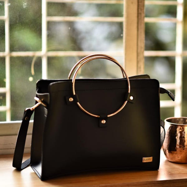 Buy/Send Sling Bag Golden Ring Online | IGP | JVS1249823