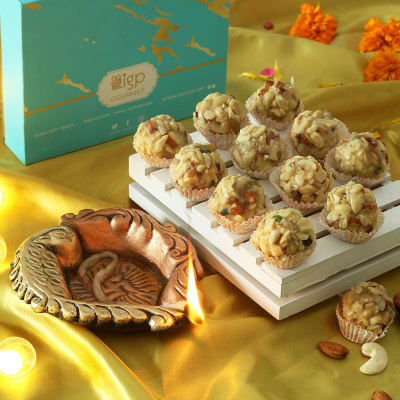 Buy/Send Centerpiece Clay Diya with Dry Fruit Ladoo (400 Gms) Online ...