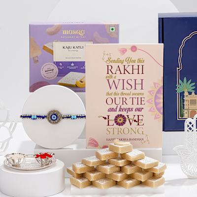 Buy/Send Classic Evil Eye Rakhi And Sweets Hamper Online | IGP | JVS1416711