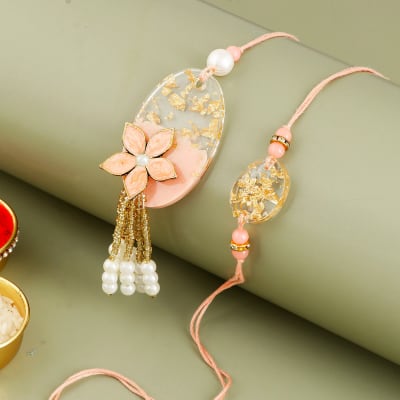 Buy/Send Gold In Resin Bhaiya Bhabhi Rakhi Online | IGP | J11141254