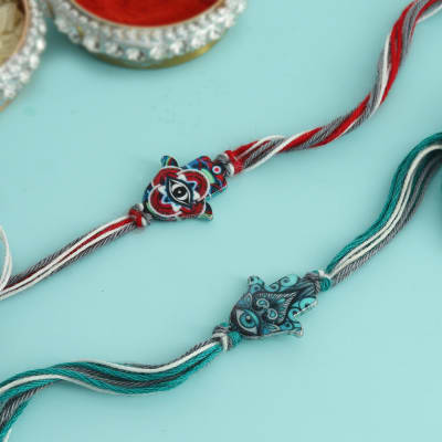 Buy/Send Hamsa Symbol Meena Rakhi (Set of 2) Online | IGP | J11141071