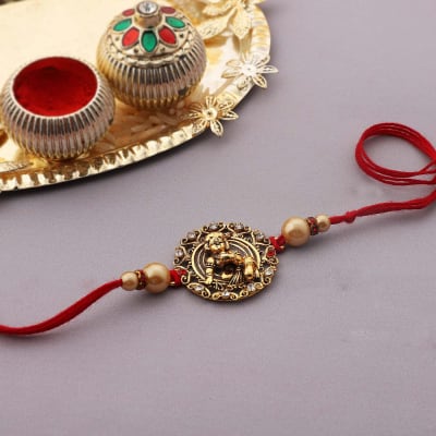 Buy/Send Kanha Antique Metal Rakhi Online | IGP | L11144008