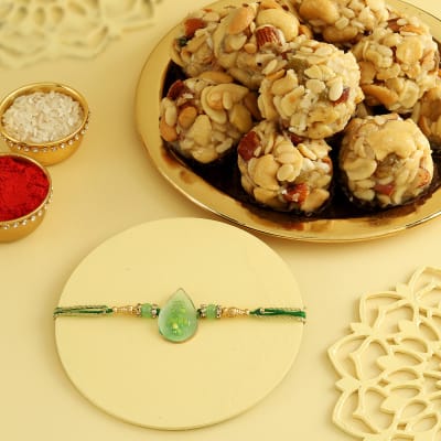 Leaf Rakhi & Dry Fruit Ladoo Hamper: Gift/Send Food Gifts Online ...