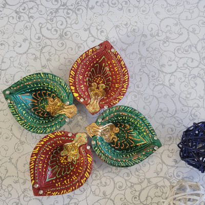Buy/Send Set of Four Beautiful Diyas Online | IGP | JVS1268247
