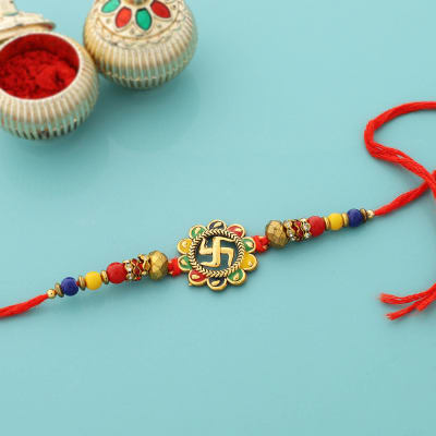 Buy/Send Swastika Meena And Beads Rakhi Online | IGP | J11144411